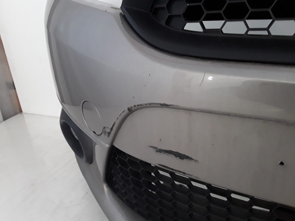 Used Dacia Logan Front bumper and its parts (set) 620227557R