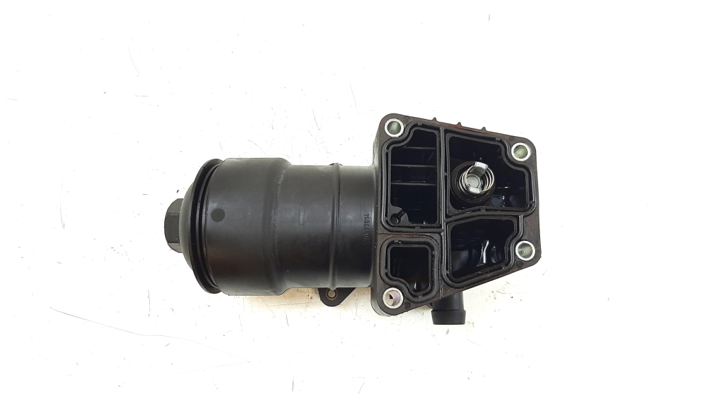 Used Volkswagen Passat Oil filter housing 03L115389C