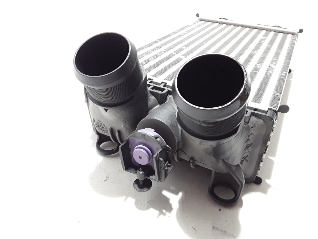 Used Peugeot 208 Intercooler radiator 9824742280